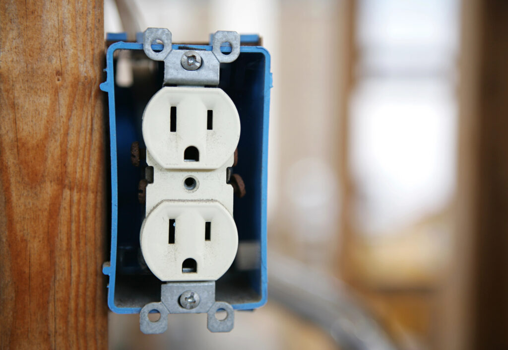 Why Are There Loose Outlets in Your Apartment Building? - Bolt Electric